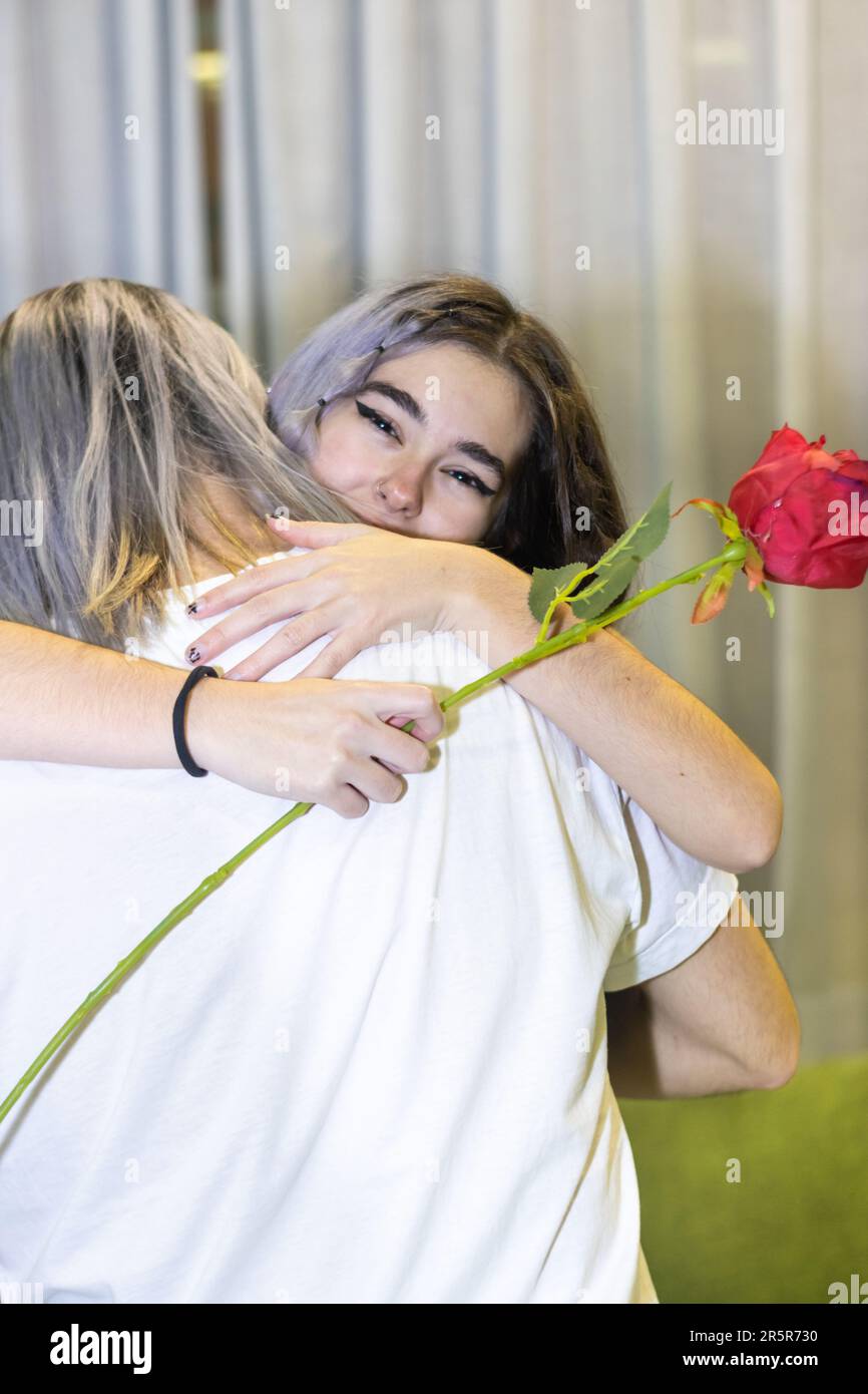 Woman giving heartfelt hug hi-res stock photography and images - Alamy