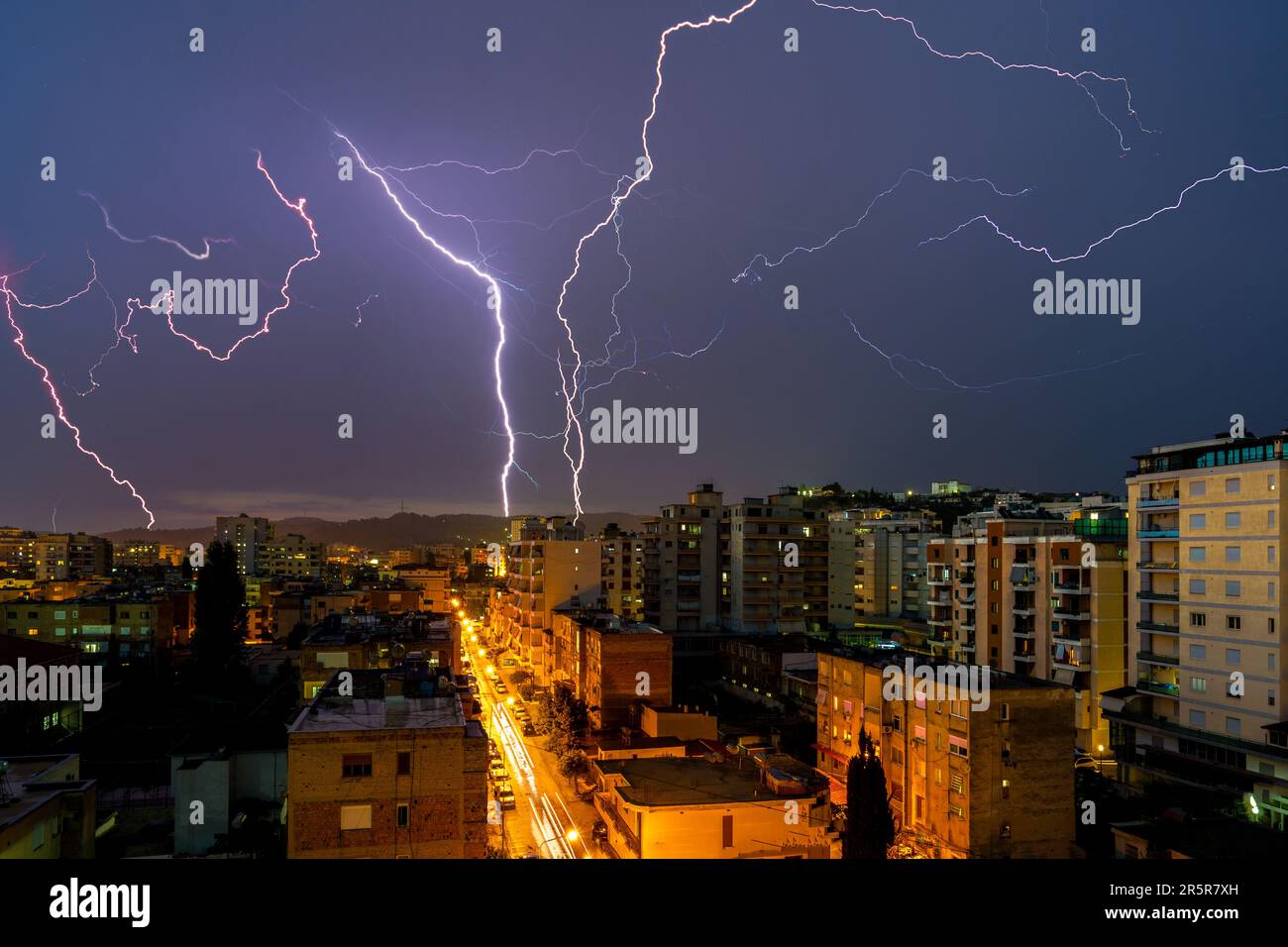 Lightning bolt over town in hi-res stock photography and images - Alamy
