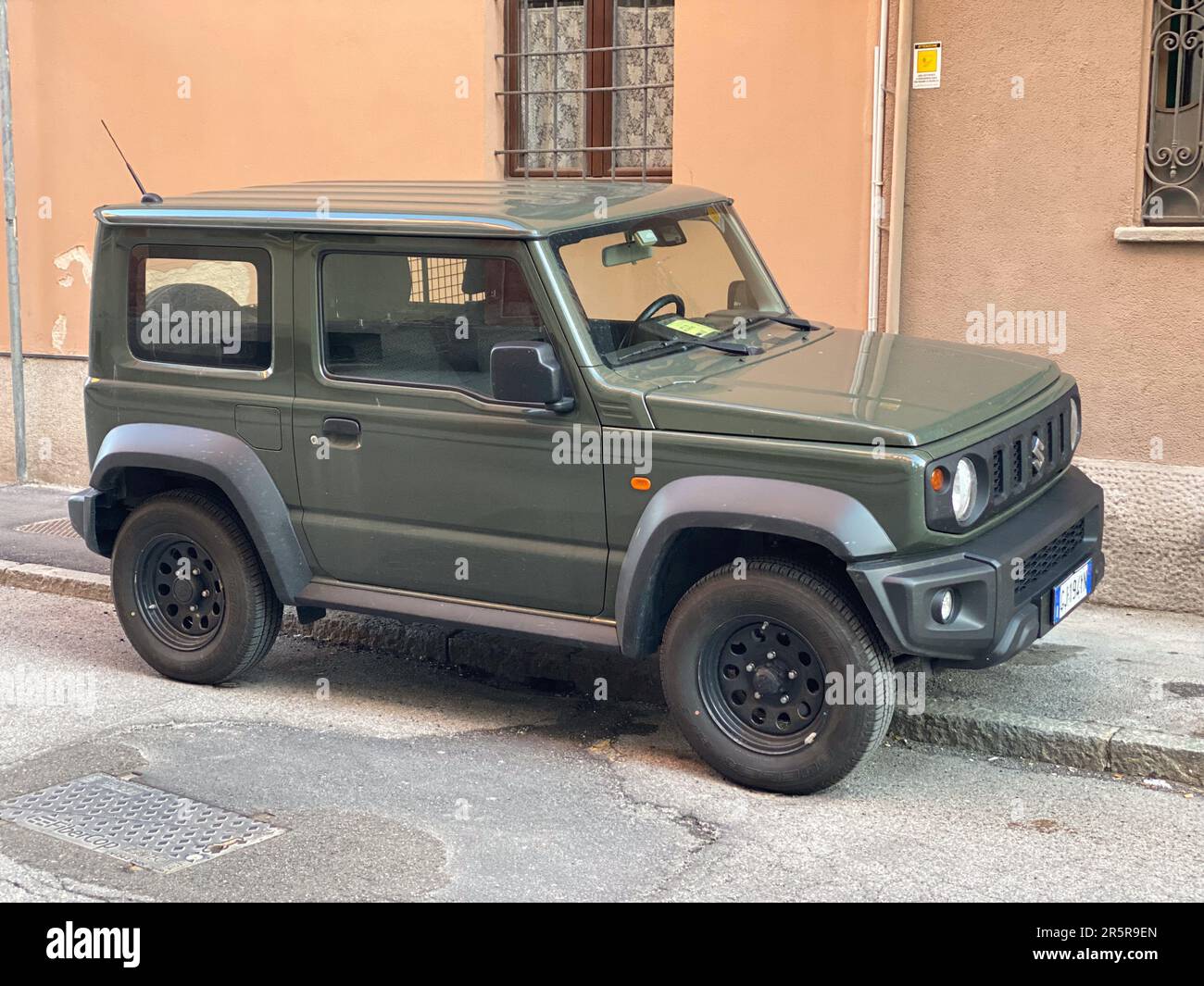 Cremona, Italy - May 2023 amazon green suzuki 4x4 jimny pro 4WD ALLGRIP ...