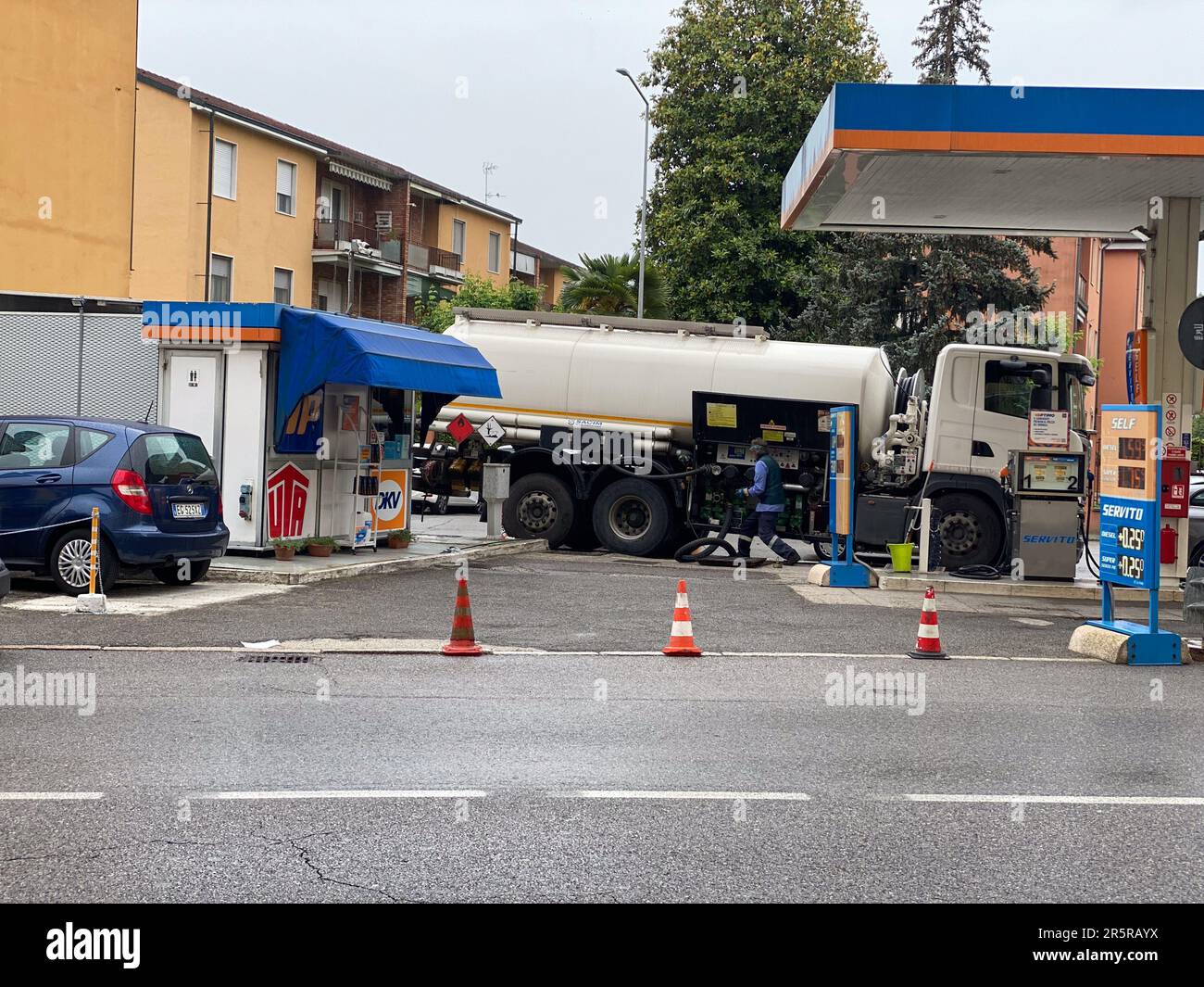 Cremona, Italy - May 2023 Gas truck delivering supplying fuel at ip ...