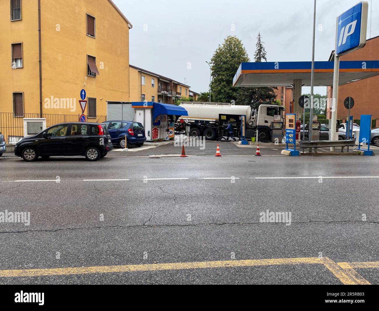 Cremona, Italy - May 2023 Gas truck delivering supplying fuel at ip ...