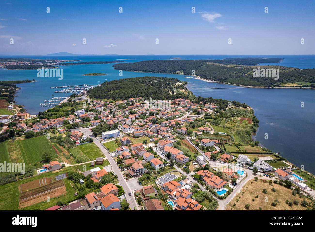 An aerial view of the stunning Croatian coastal town of Pomer, with its ...