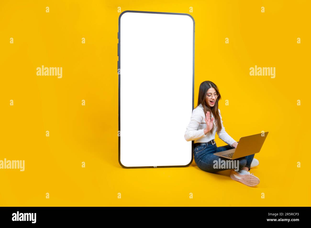 Full length body view sitting woman waving hand. Say hi hello get video ...