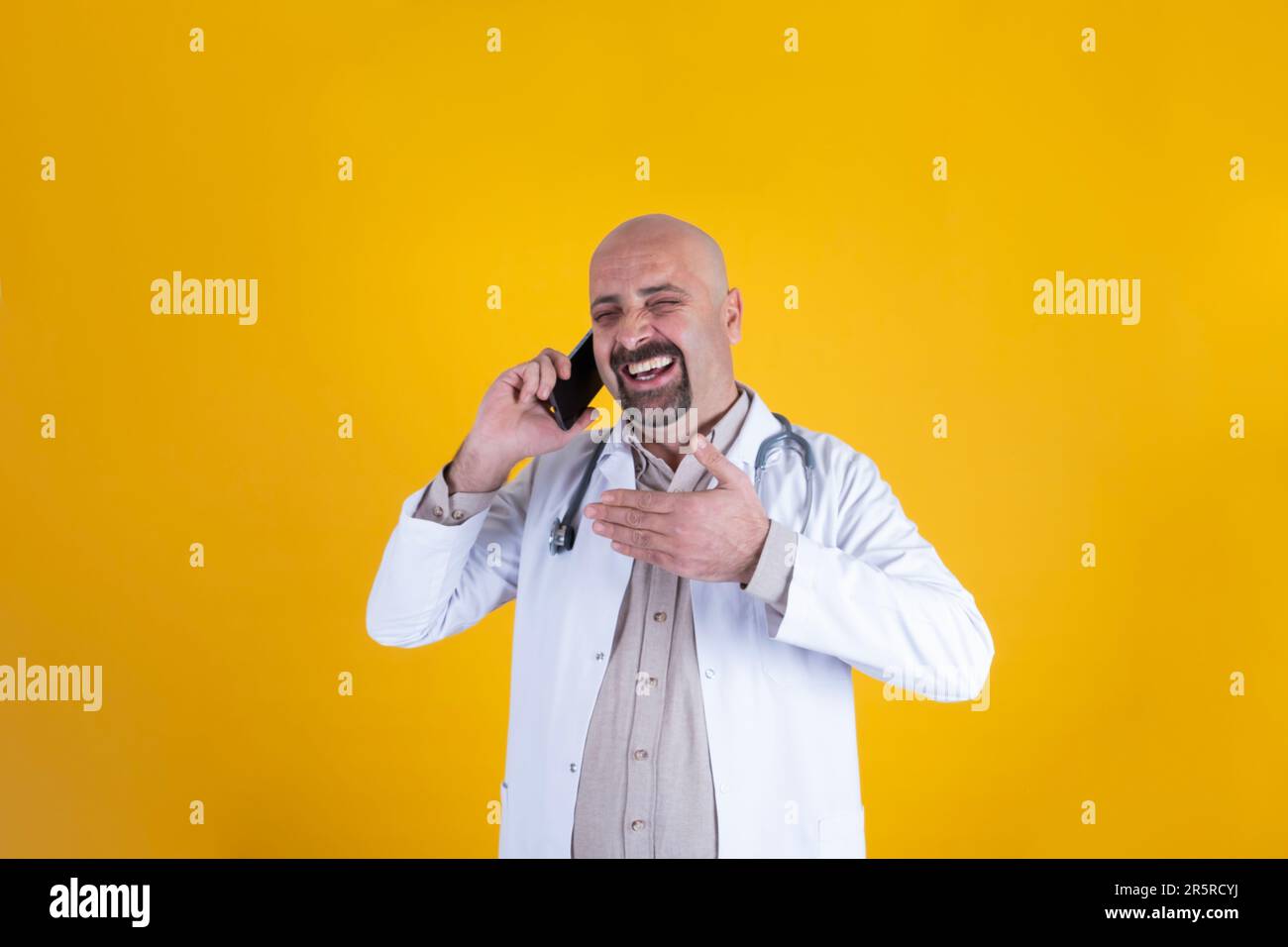 Caucasian male doctor wearing phone hi-res stock photography and images - Alamy
