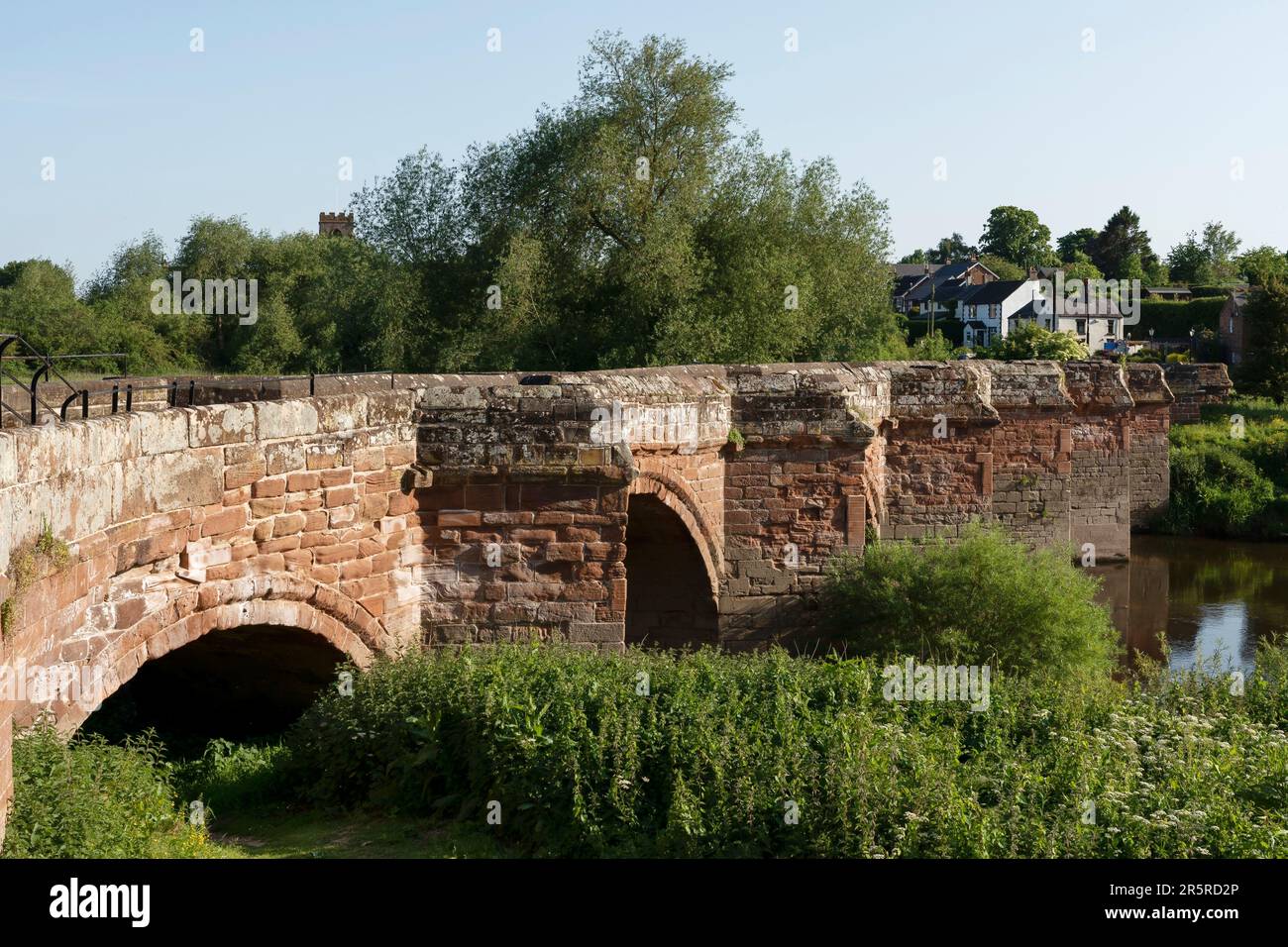 The Farndon bridge or Holt bridge crossing the River Dee with Holt ...