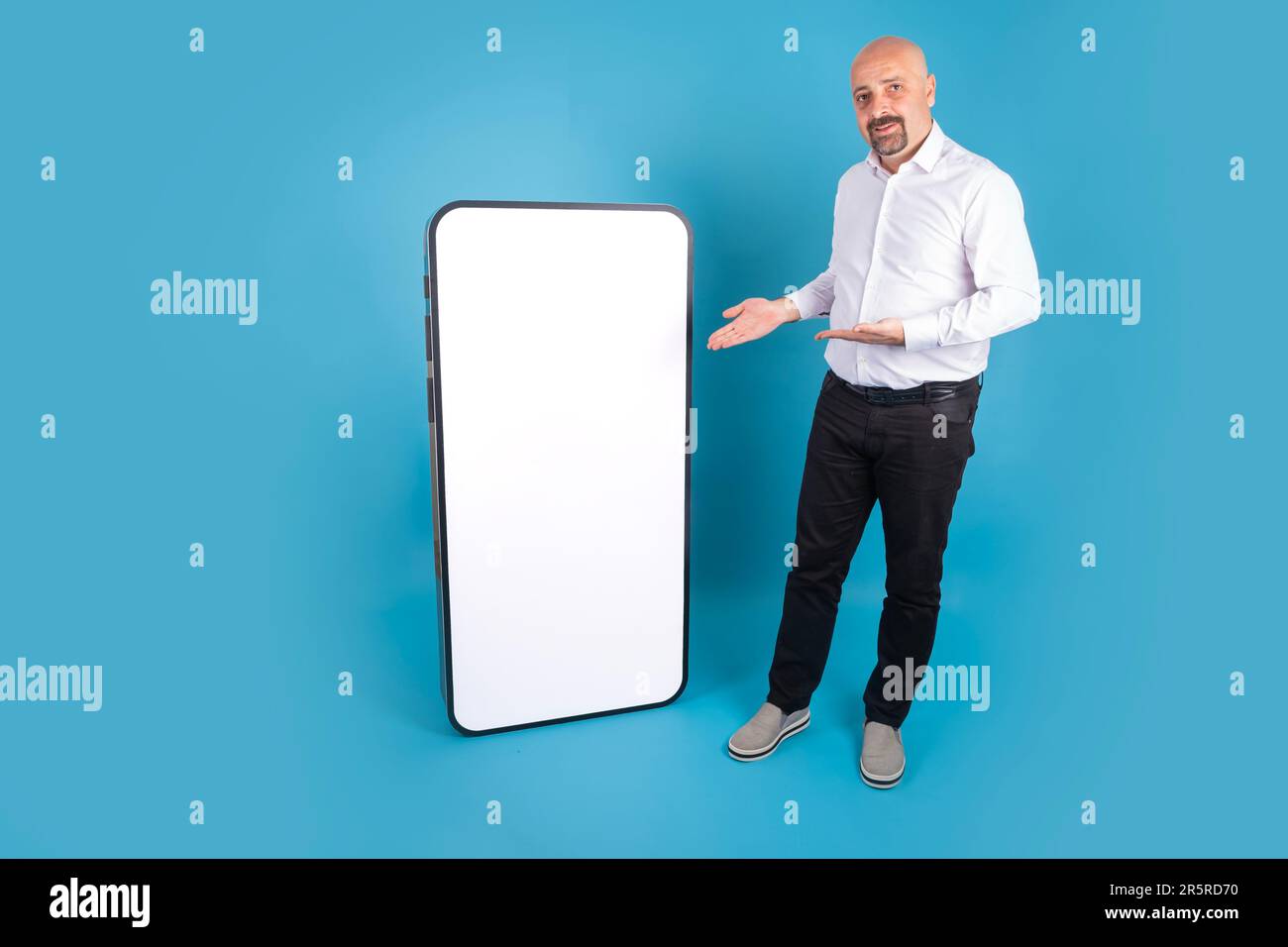 Mobile app advertisement, caucasian bald middle aged man recommending ...
