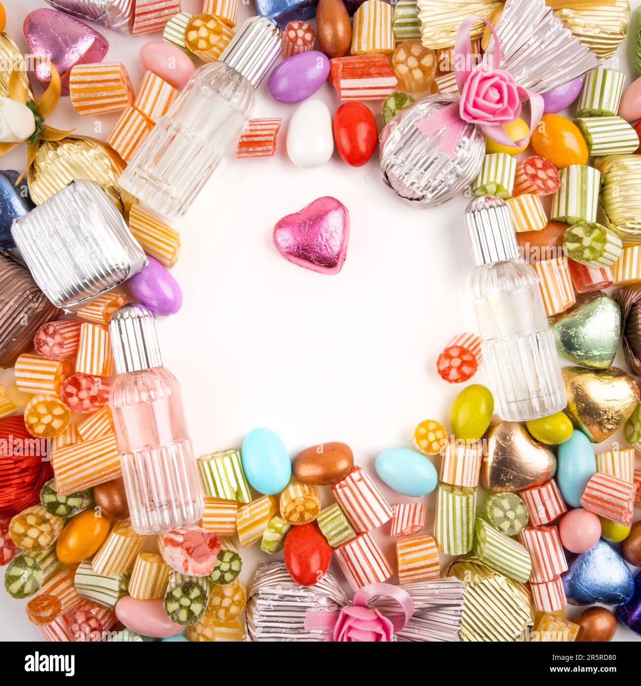 op view square image of colorful sweets. Cologne bottle. Traditional ...