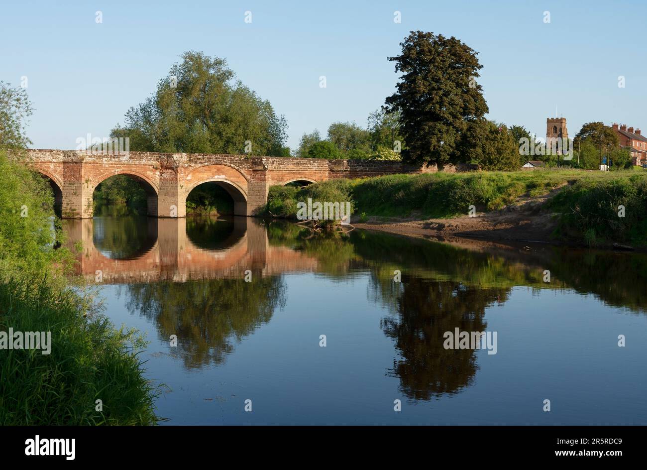 The Farndon bridge or Holt bridge crossing the River Dee with Holt ...