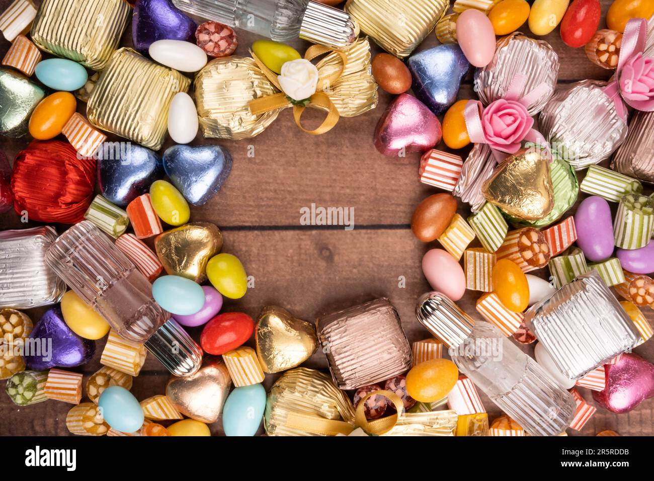Top view close up image group of sweet candies. Wrapped chocolate ...
