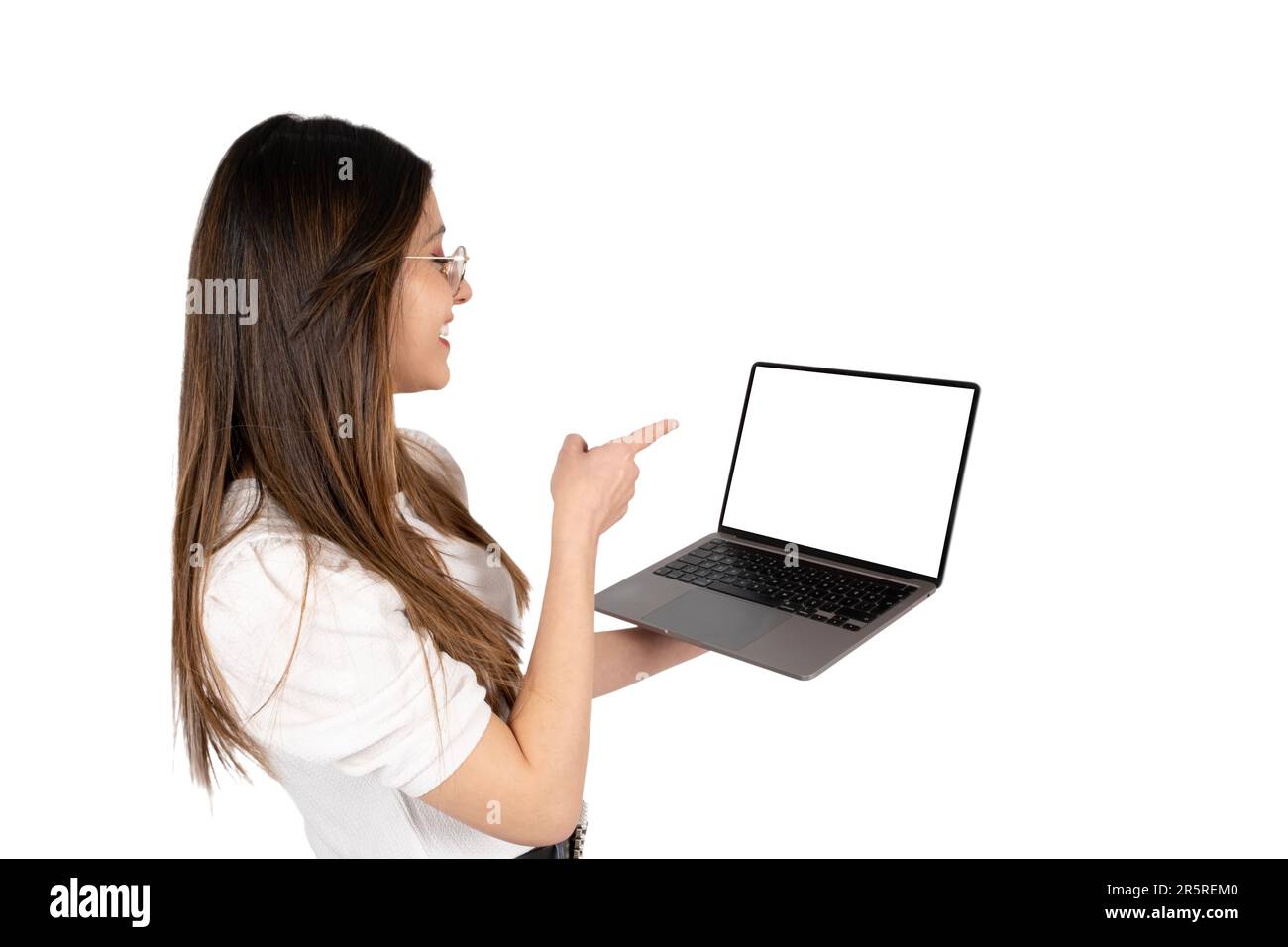 Woman pointing empty laptop screen, over shoulder portrait of caucasian ...