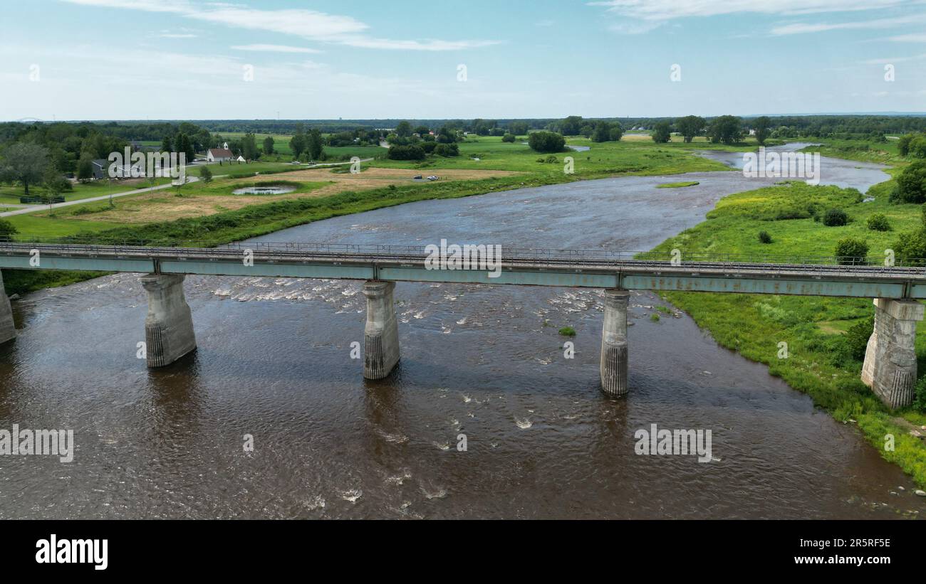 A scenic view of a historic train bridge crossing the river in Wolinak ...