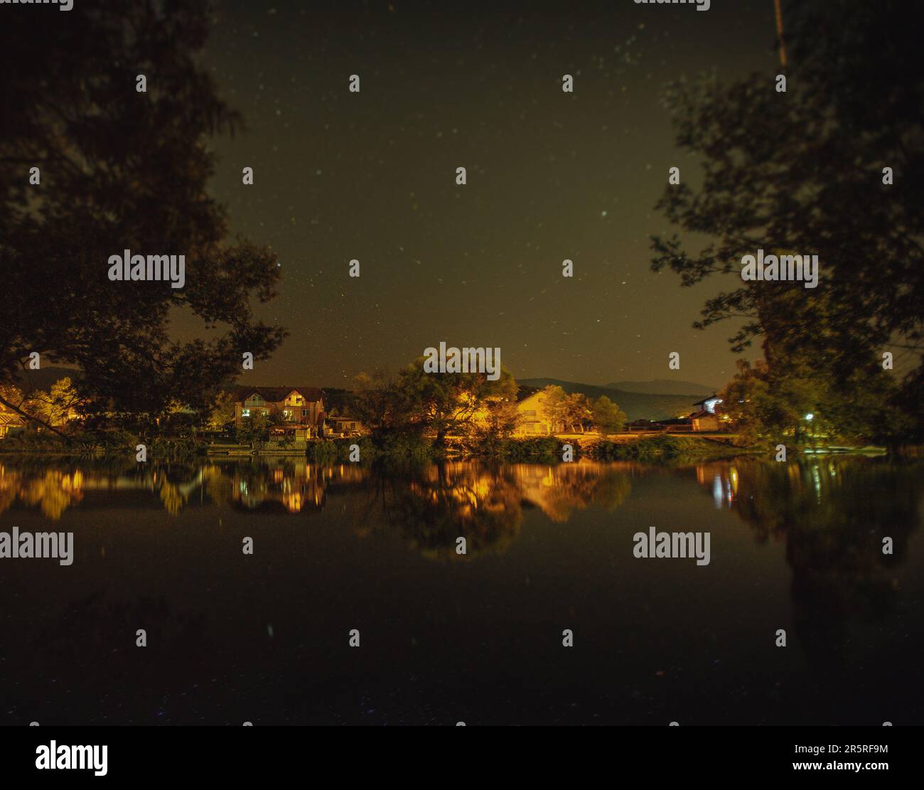 A stunning nighttime landscape featuring a tranquil park landscape ...
