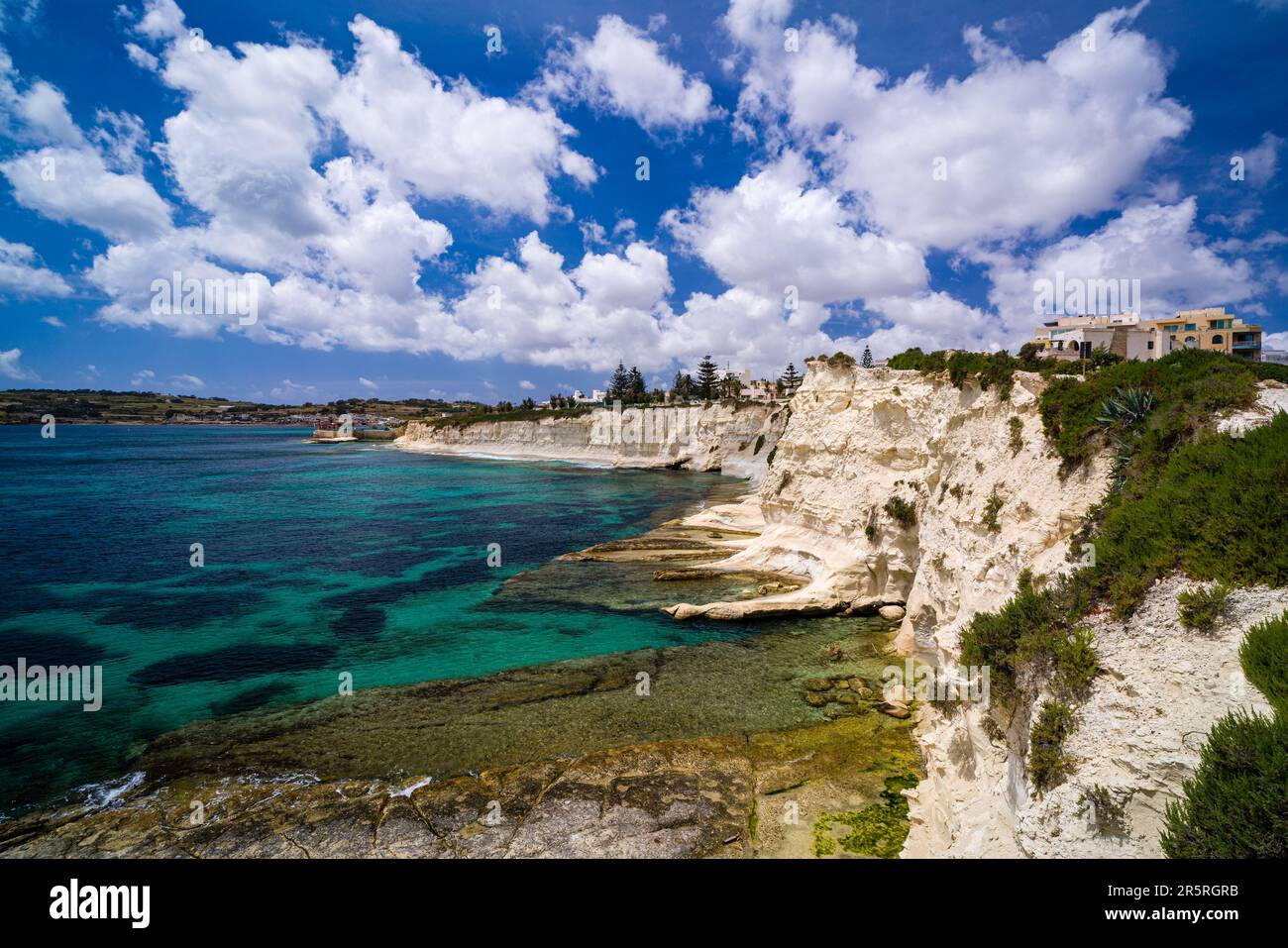An aerial view of ocean waves washing rocky beach in Malta Stock Photo ...
