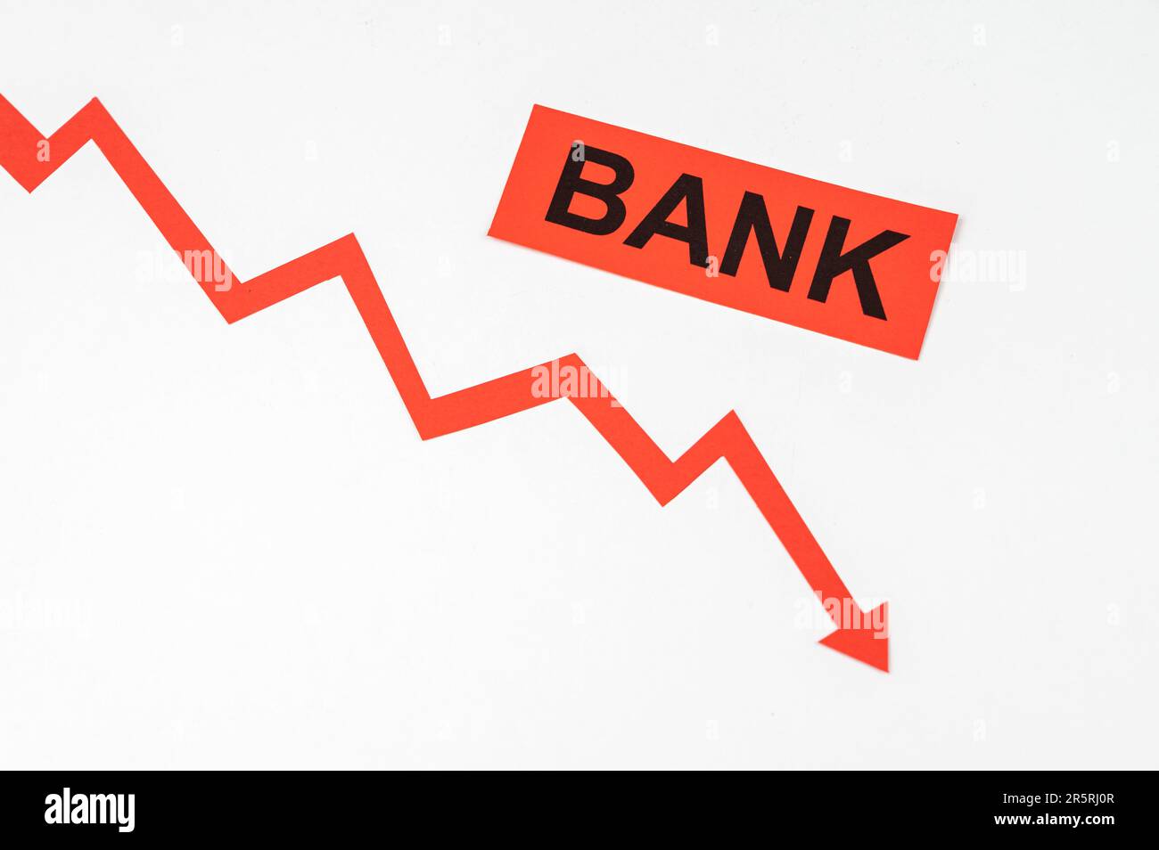 Descending red line, word Bank. Bank failure and economic and financial ...