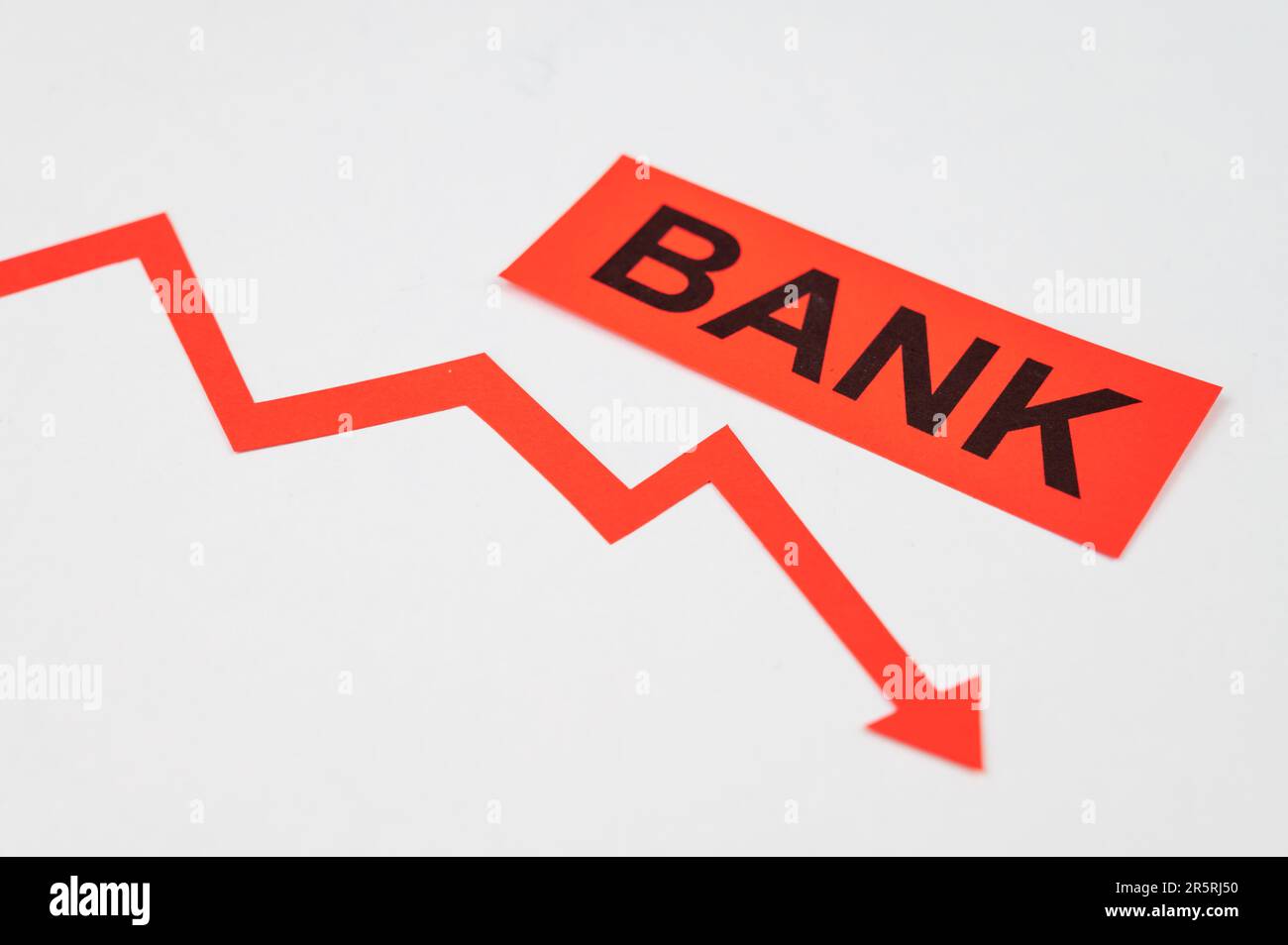 Descending red line, word Bank. Bank failure and economic and financial ...