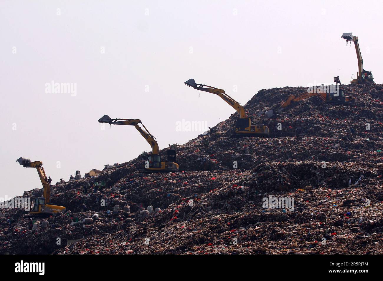 Bekasi, West Java province, Indonesia. 5 June, 2023. Excavators are ...