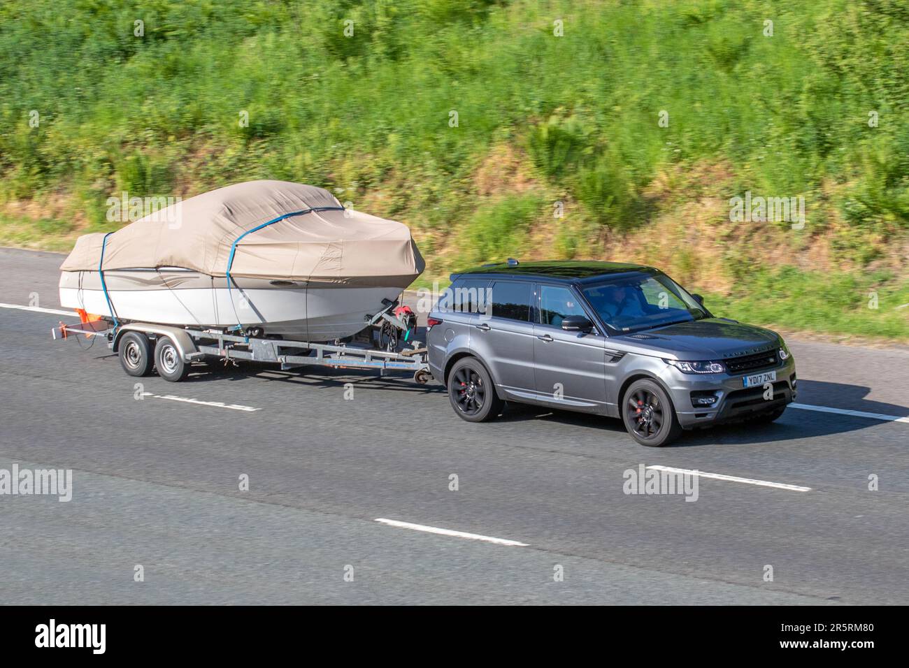 2017 Grey Land Rover R Rover Sport HSE Dynam S, towing speedboat on a ...