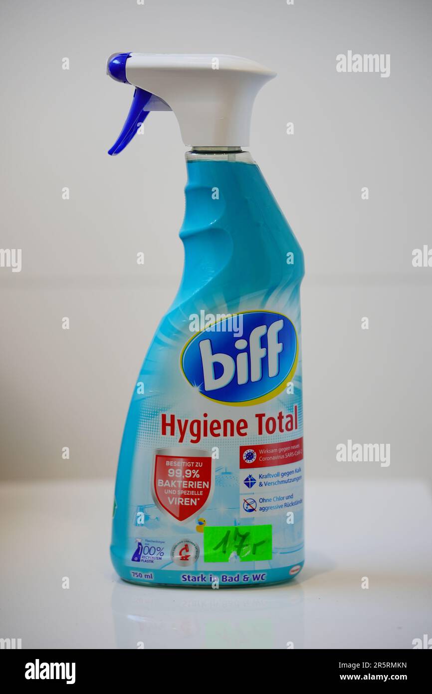 A blue and white Edeka Zentrale Biff Total Cleaner on a white ...