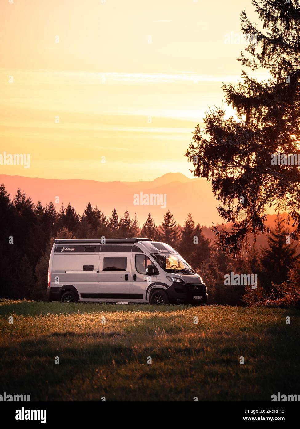 Traveling with a Campingcar in the nature surrounded by woods and ...