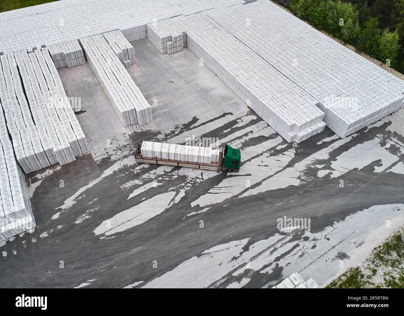 Factory warehouse of foam concrete blocks. Aerial view Stock Photo - Alamy