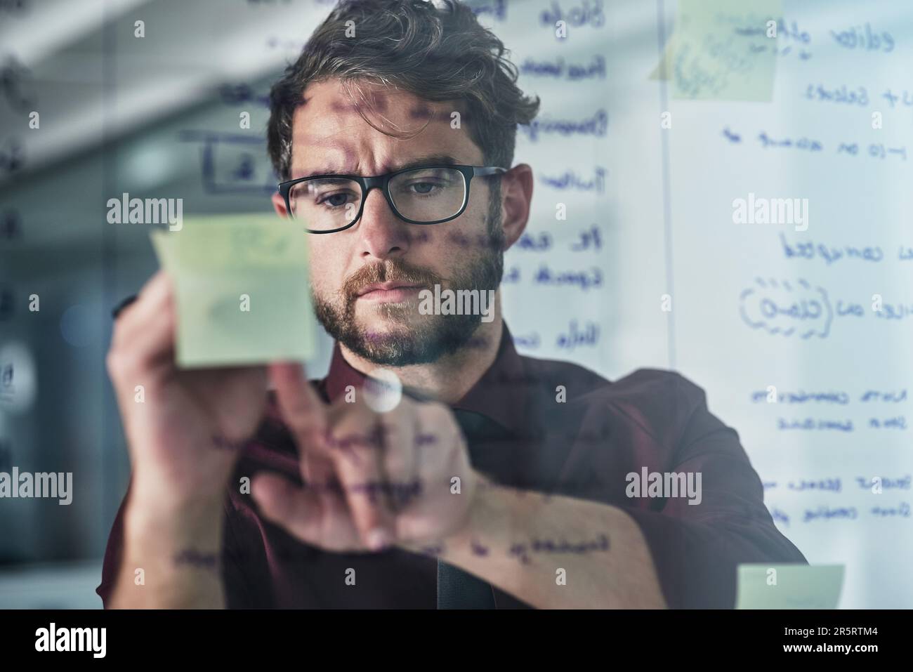 Driving idea generation with a determined mindset. a young businessman ...