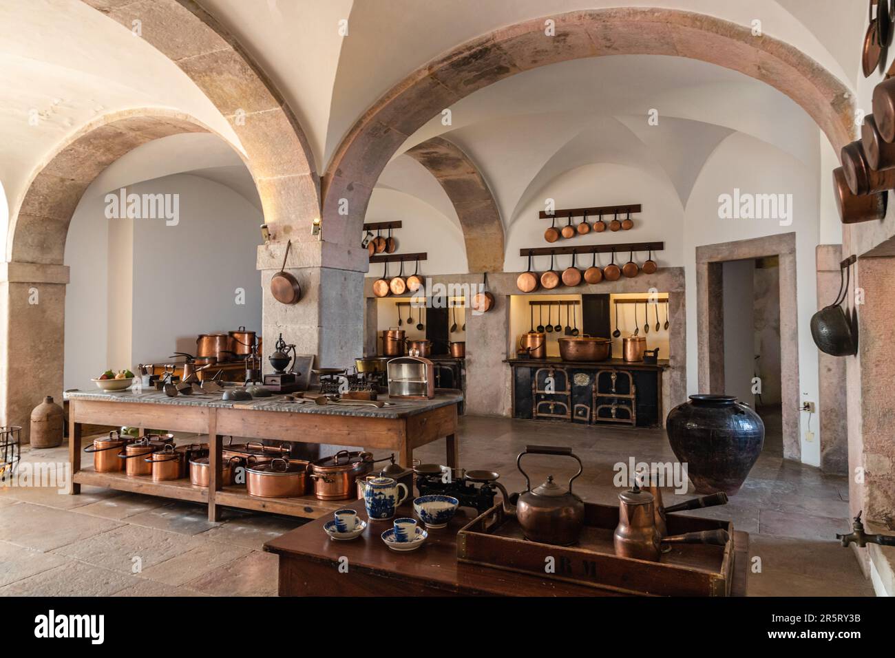 Large antique kitchen with pots Stock Photo - Alamy