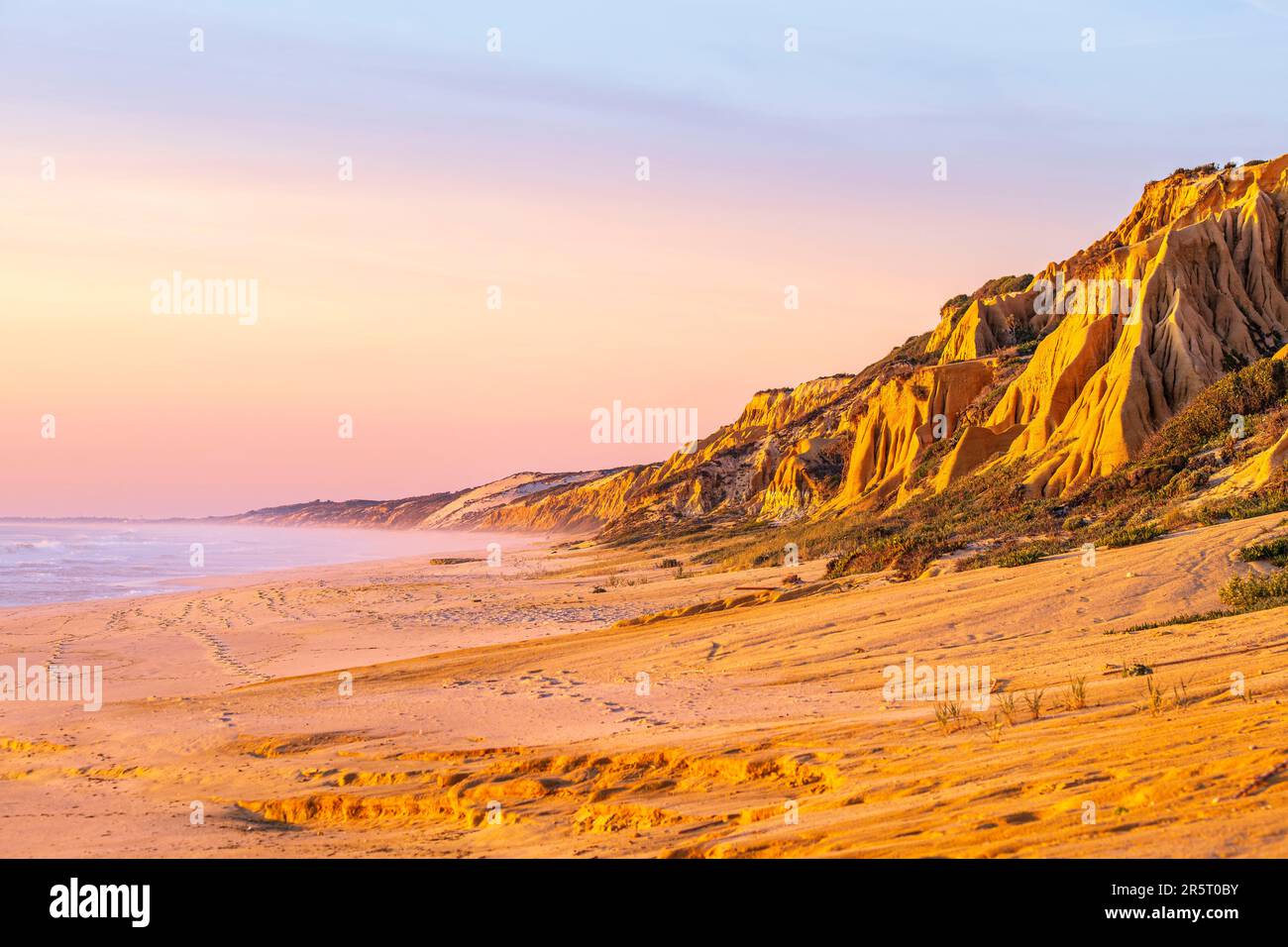 Portugal, Alentejo region, Melides, ochre cliffs overlooking Galé ...