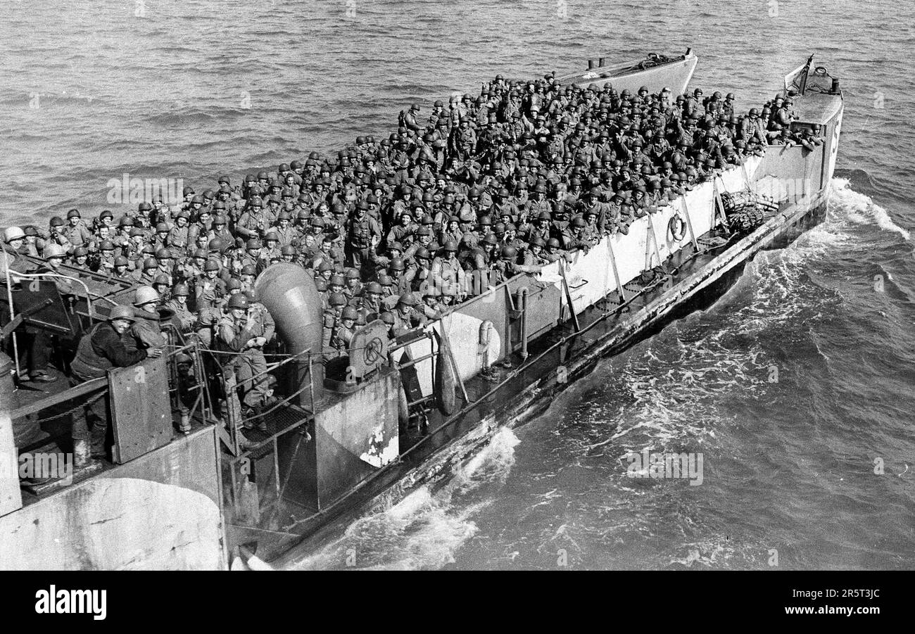 FILE - American troops pack a landing craft underway to a beachhead at ...