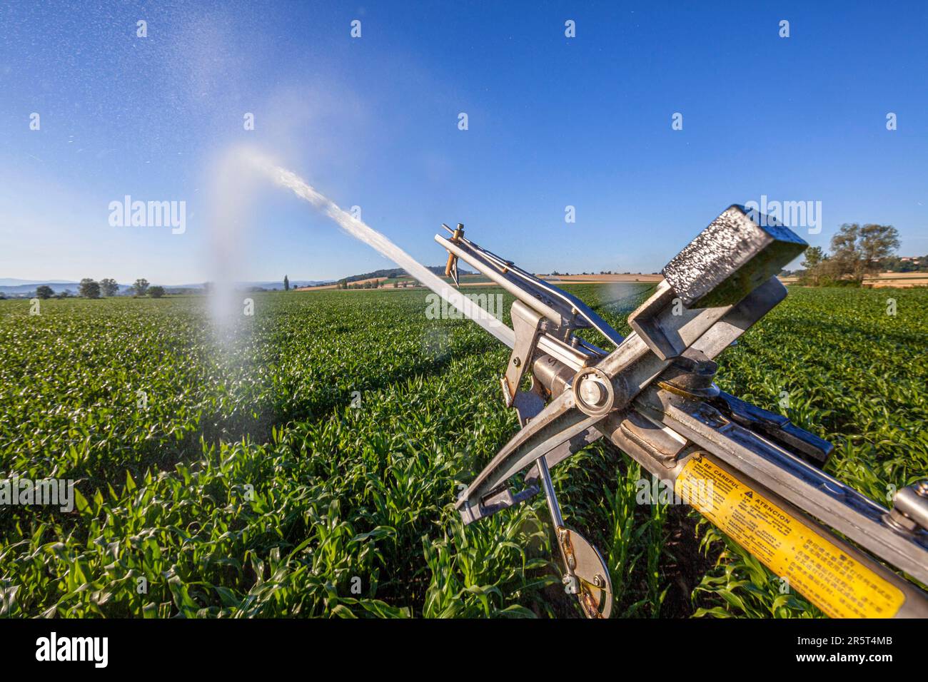 France, Puy de Dome, irrigation of a corn field by water pump, Limagne ...