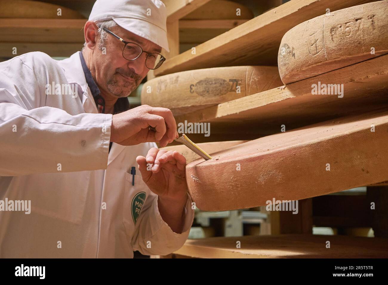Comte cheese wheel hi-res stock photography and images - Alamy