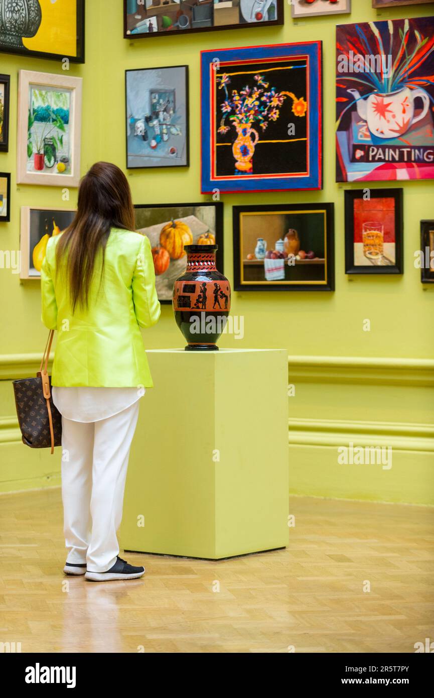 London, UK. 5 June 2023. A visitor views a ceramic 'Reflecting the time ...