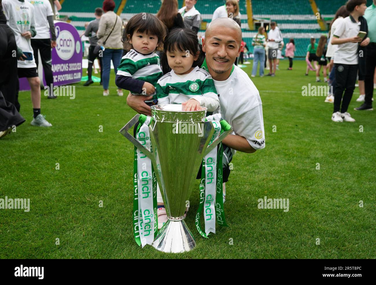 Celtic's Daizen Maeda and family pose with the trophy after the cinch ...