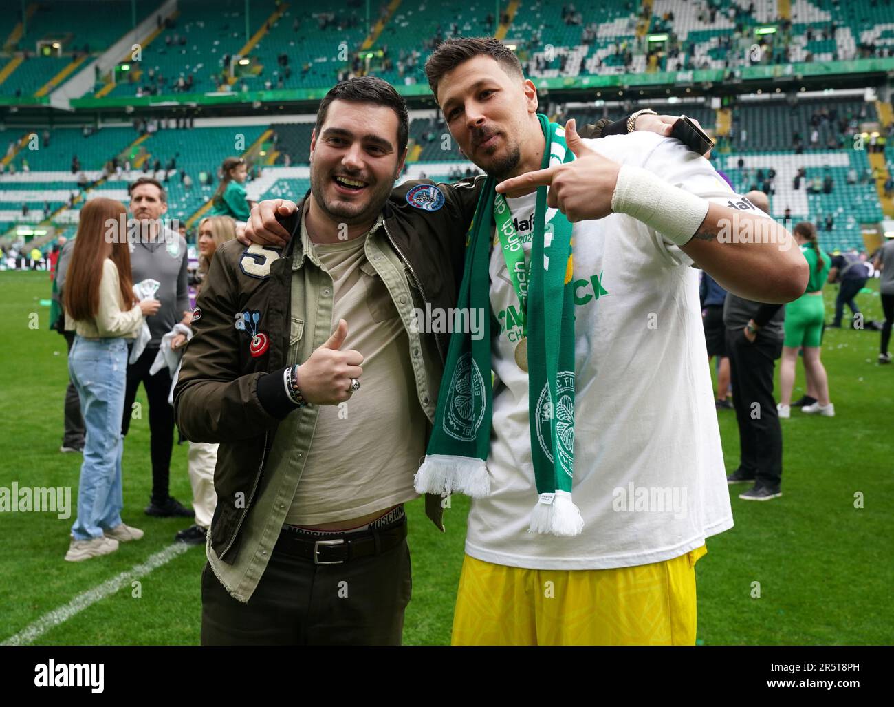 Celtic goalkeeper Benjamin Siegrist (right) celebrates following the ...