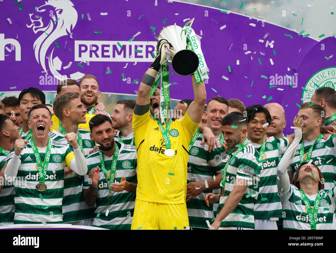 Celtic goalkeeper Joe Hart lifts the trophy following the cinch ...