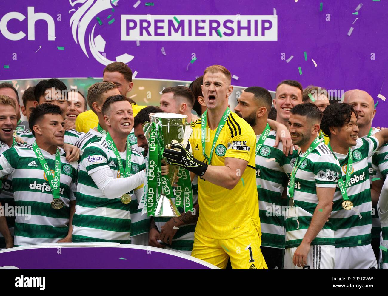 Celtic's Callum McGregor and goalkeeper Joe Hart lift the trophy ...