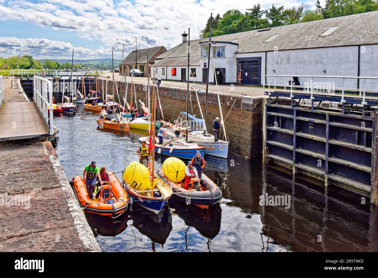 Inverness Scotland a flotilla of boats in early summer ready to leave ...