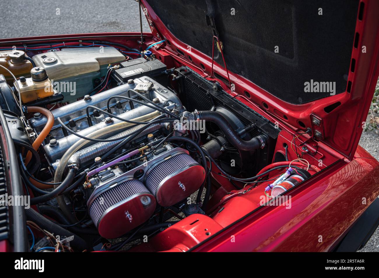 Detail of the engine of a classic red Alfa Romeo GTV 2.0 Stock Photo ...