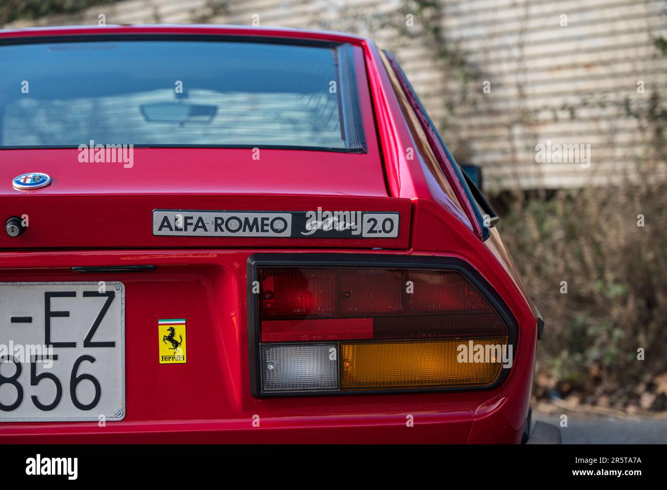Rear view detail of a classic red Alfa Romeo GTV 2.0 Stock Photo - Alamy