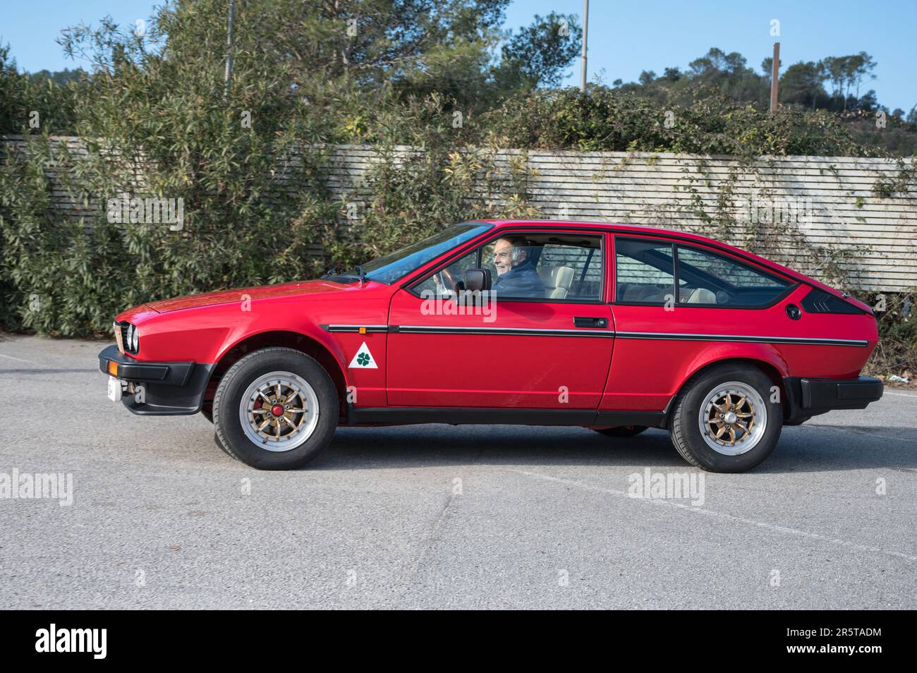 Side view of a classic red Alfa Romeo GTV 2.0 Stock Photo - Alamy