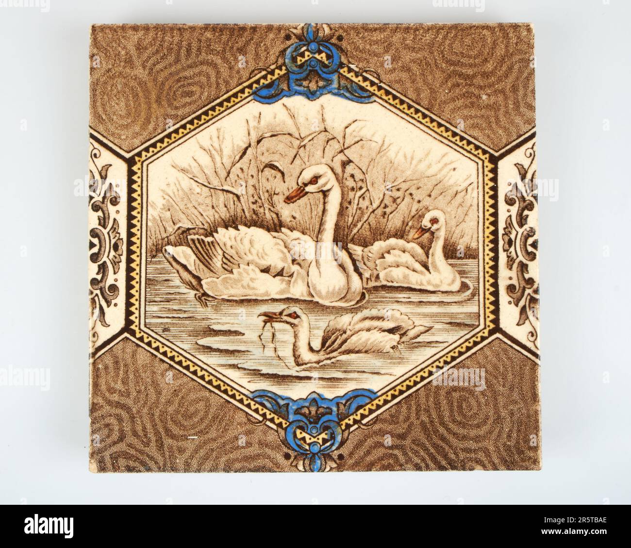 Antique 1880s English Victorian swan and cygnet pottery tile Stock Photo - Alamy