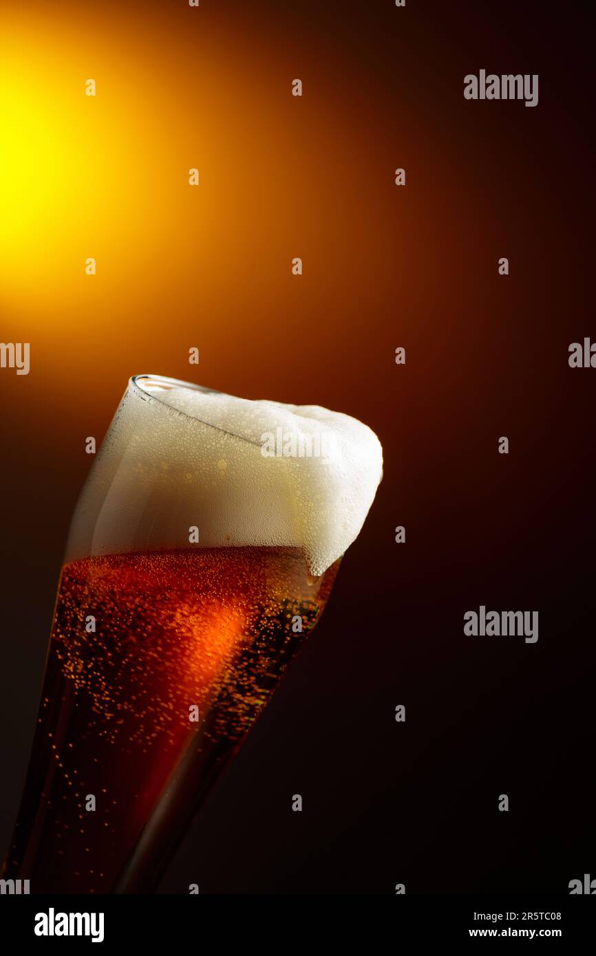 Beer in a tall glass. Copy space Stock Photo - Alamy