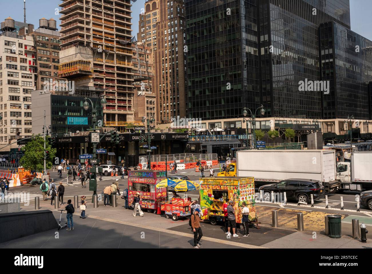 Activity on Eighth Avenue in the Herald Square neighborhood in New York ...