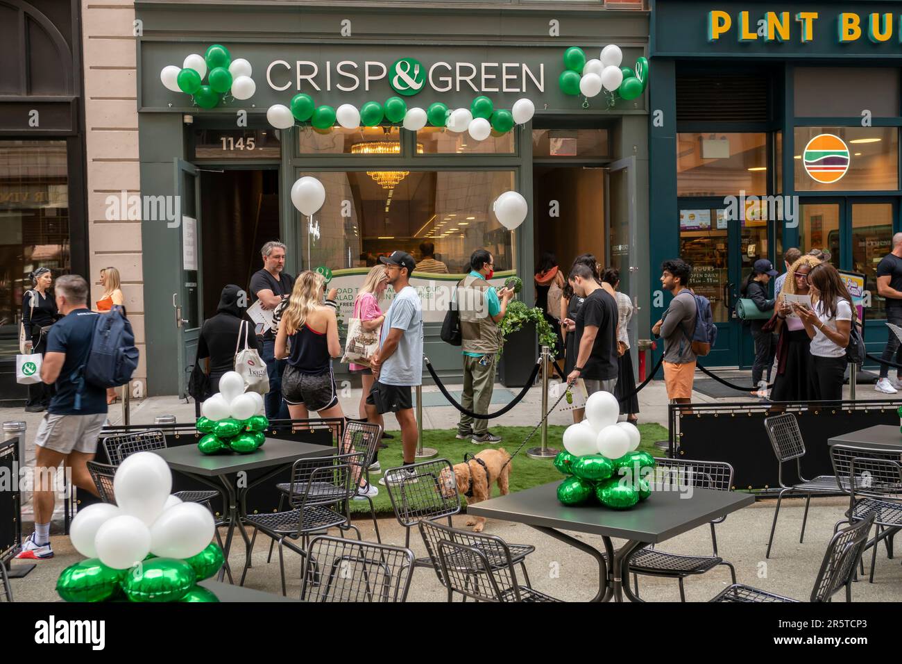 Grand opening of a branch of the Crisp & Green chain of better-for-you ...