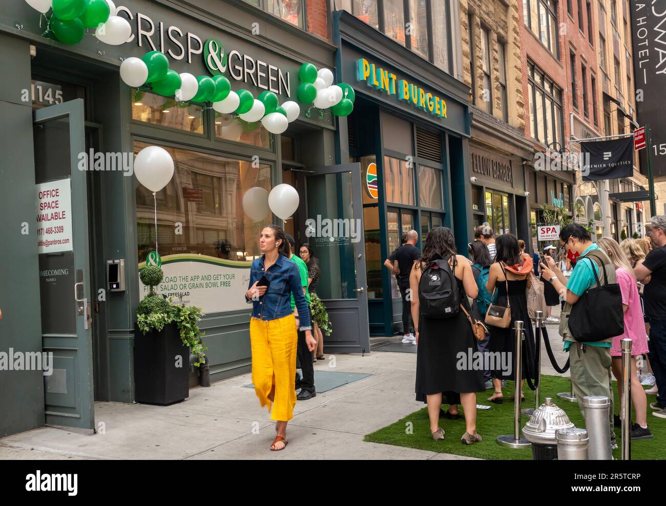 Grand opening of a branch of the Crisp & Green chain of better-for-you ...