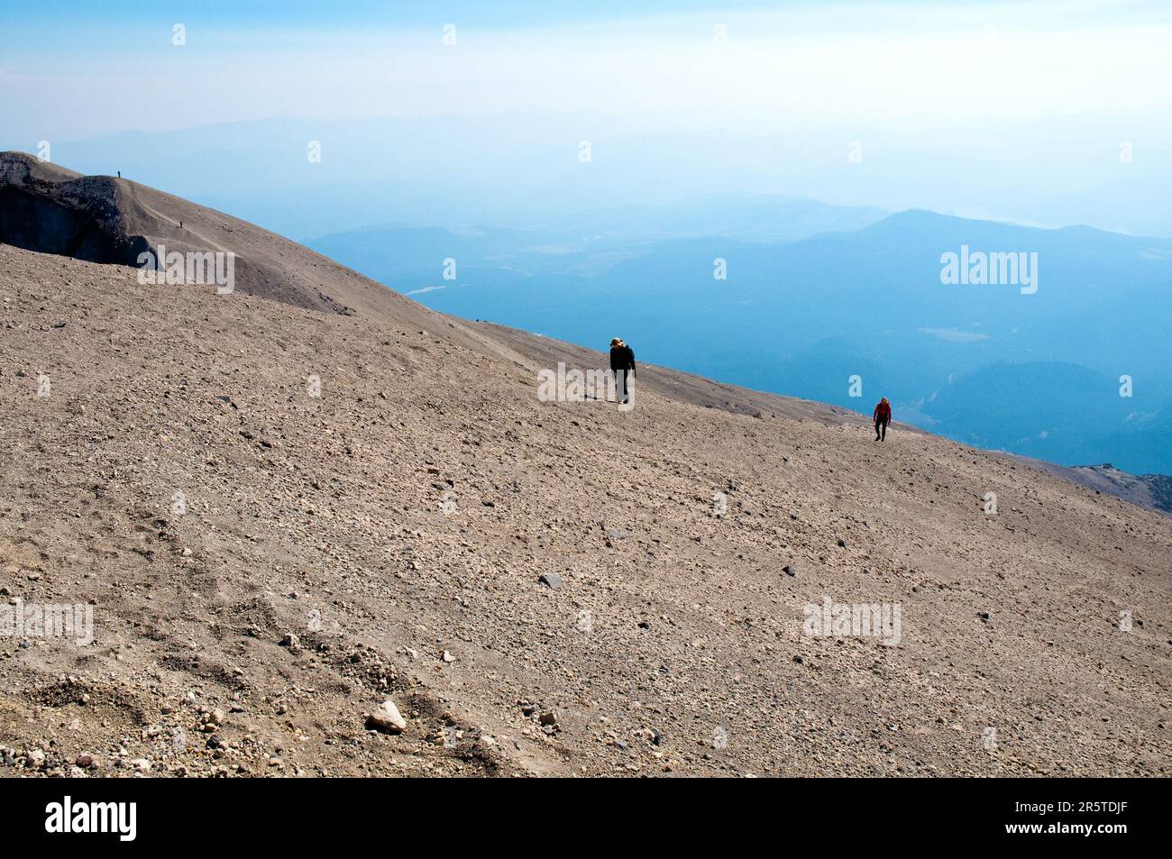 Two climbers nearing the summit of Mt Saint Helen, Washington State ...