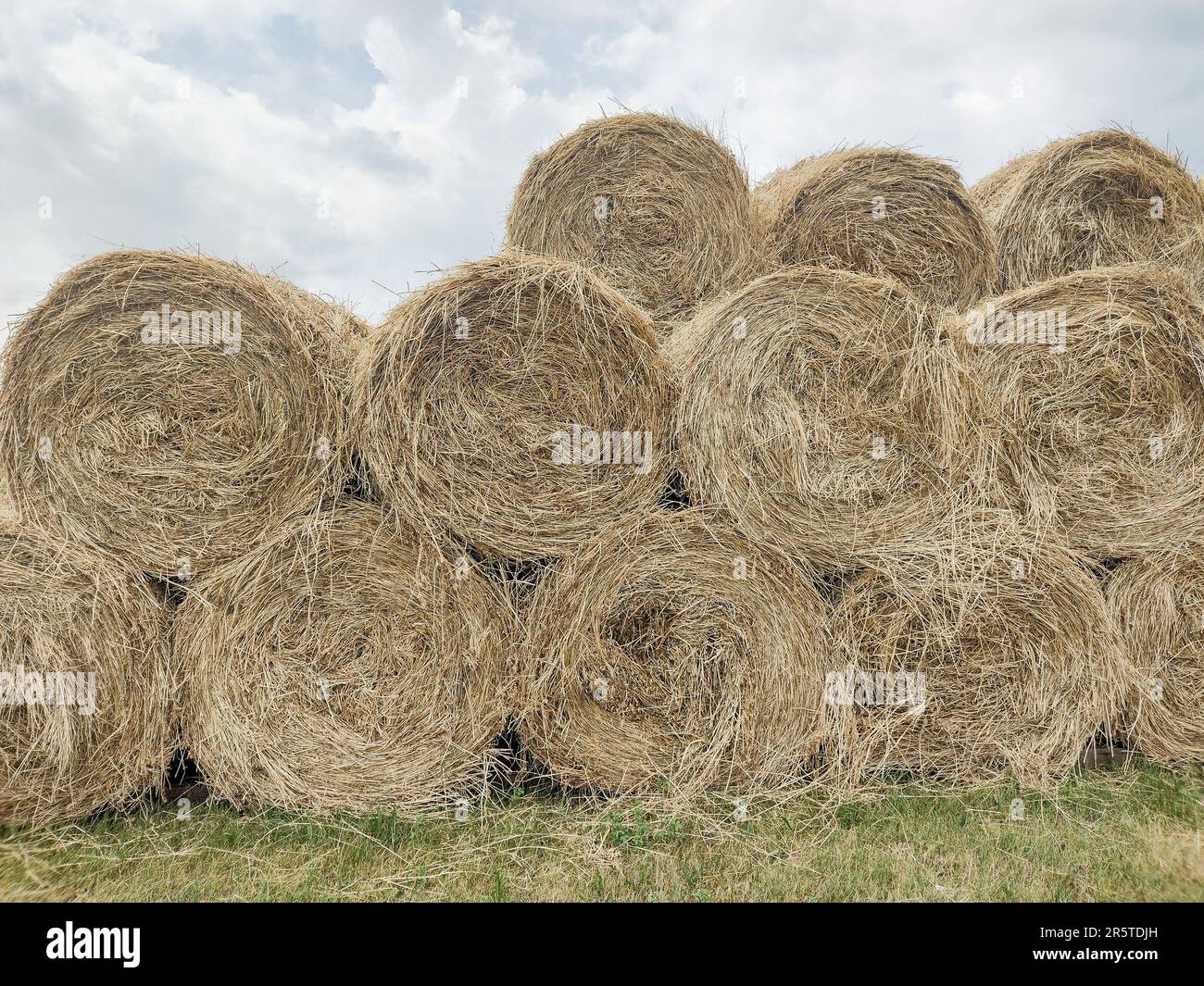 Stack of hay bales in Romania Stock Photo - Alamy