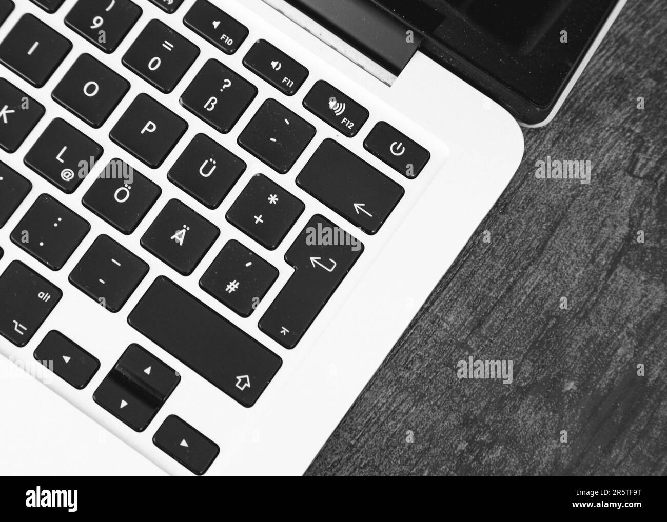 Notebook open on wooden Black and White Stock Photos & Images - Alamy