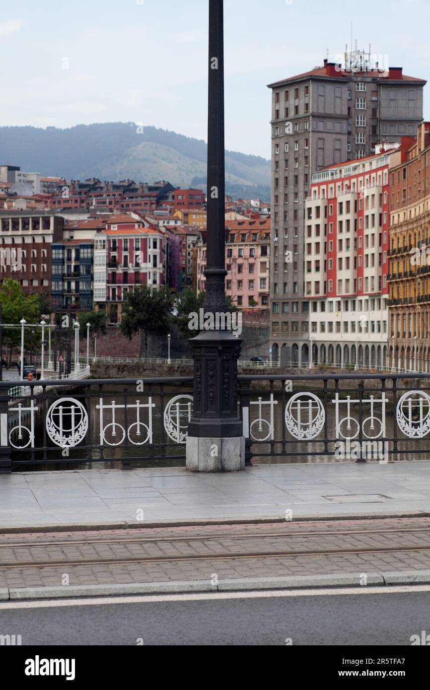 Street lamp and railing on the river bridge in the centre of Bilbao ...