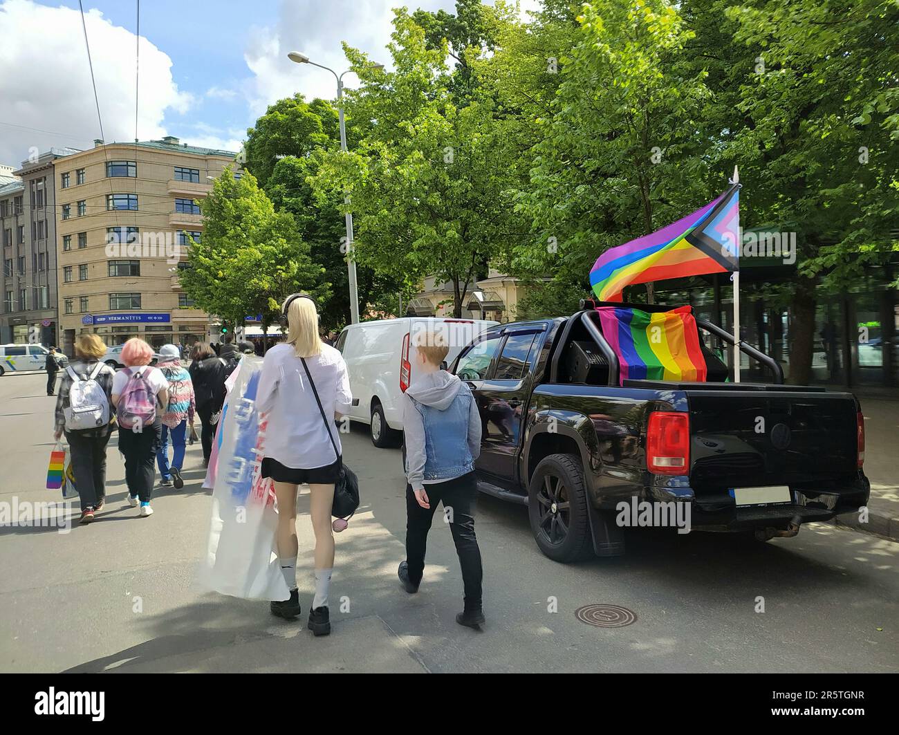 Cars in the colors of the rainbow flag on the streets of Riga during ...