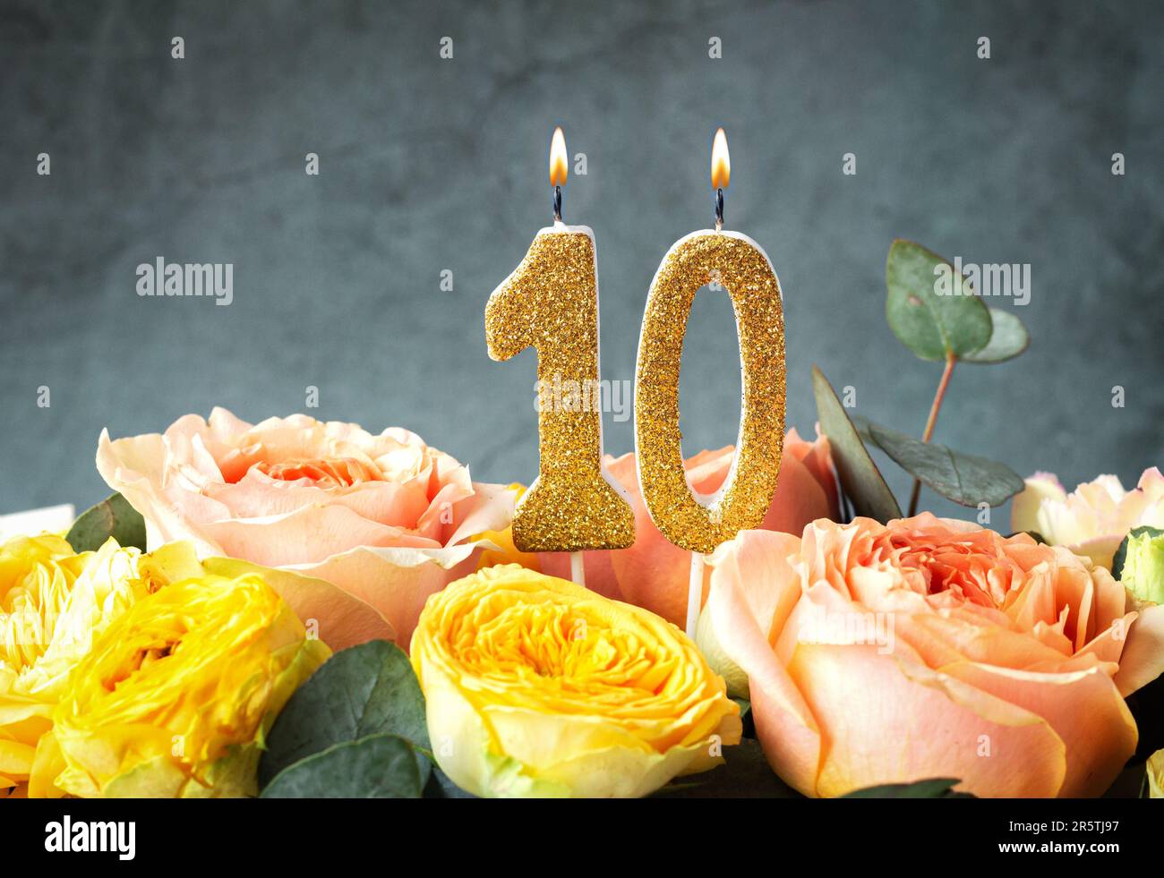 Birthday cake with burning candle number 10 hi-res stock photography ...